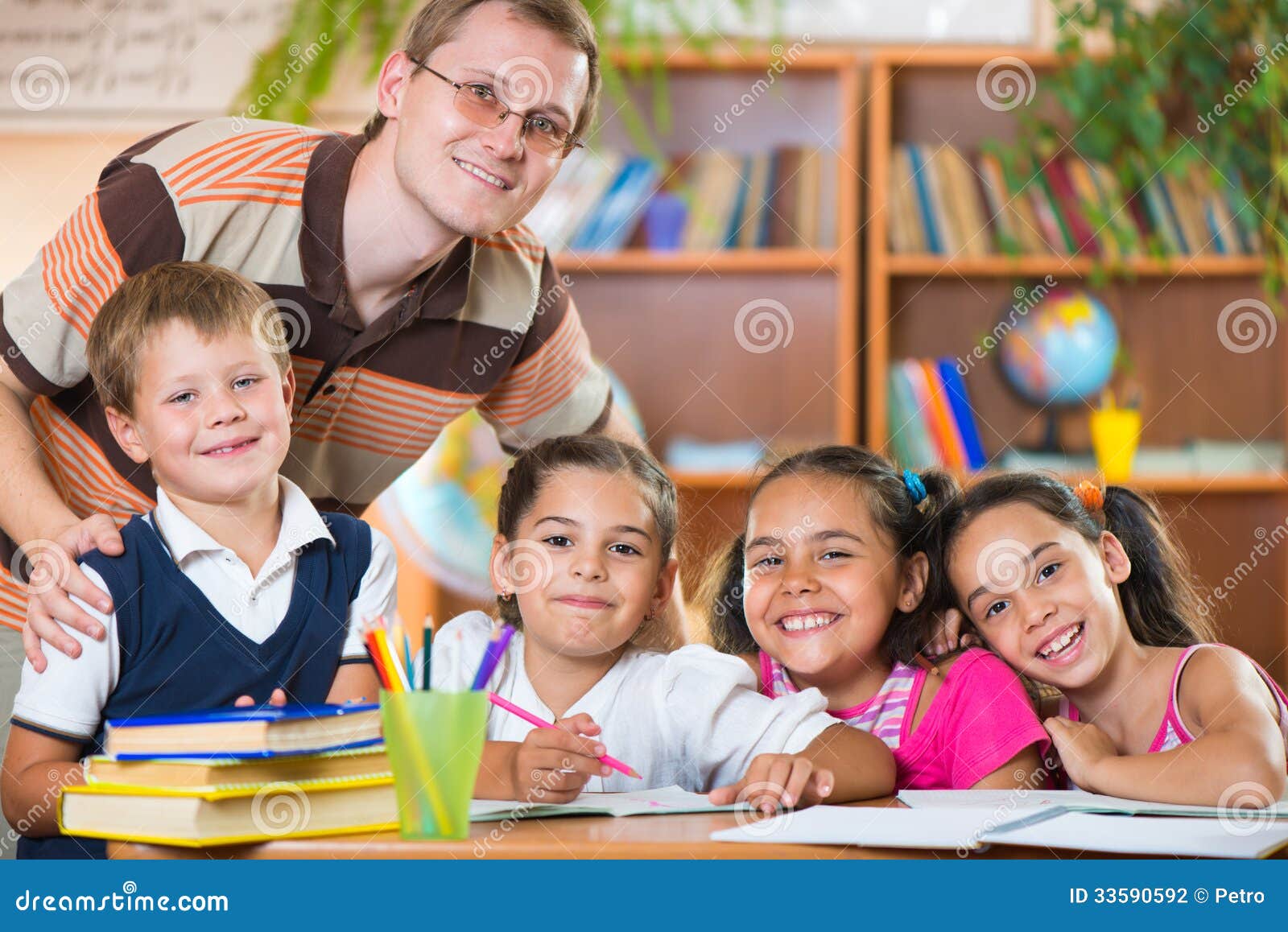 Group of Pupils in Classroom with Teacher Stock Photo - Image of ...