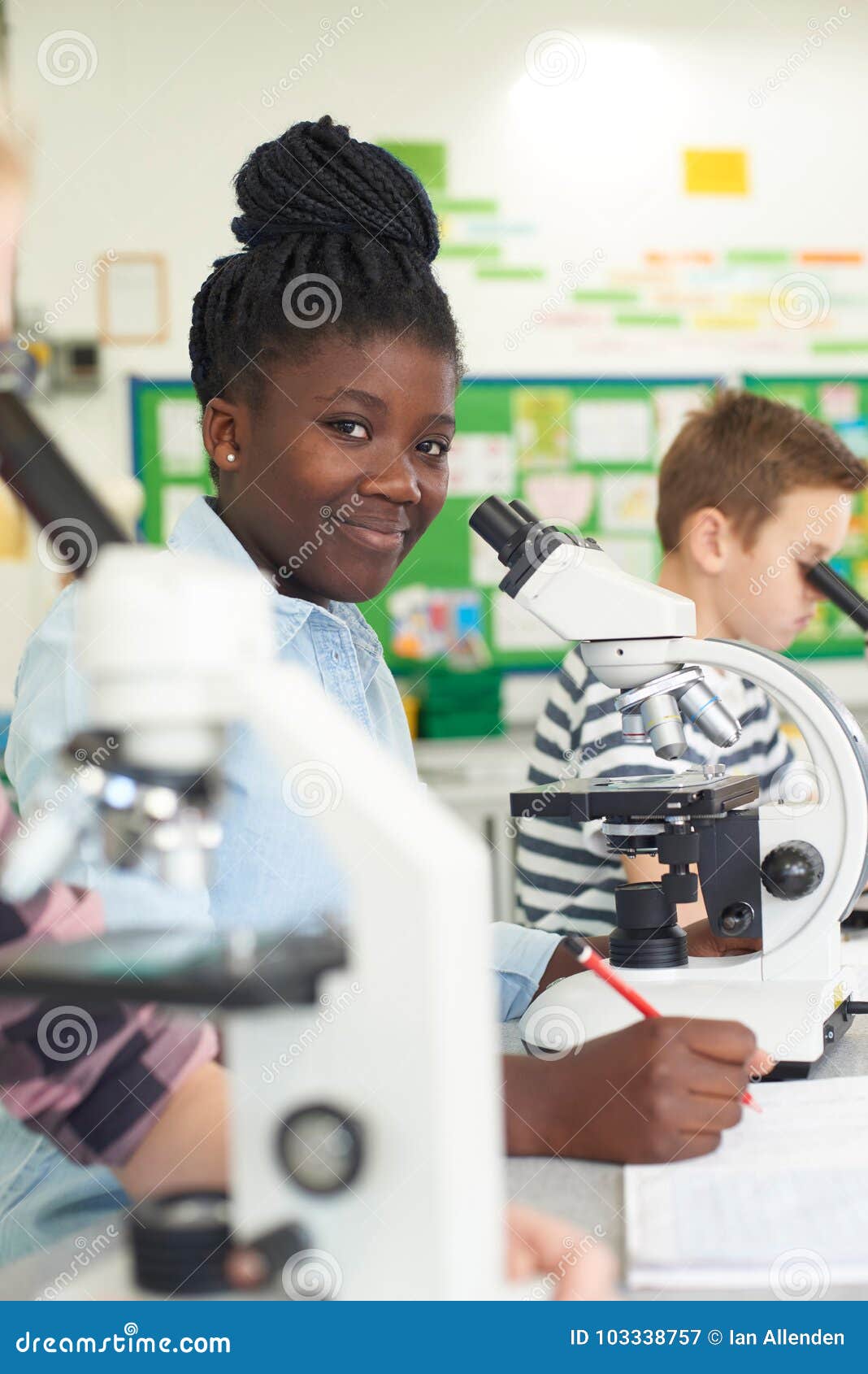 Group of Pupils Using Microscopes in Science Class Stock Image - Image ...