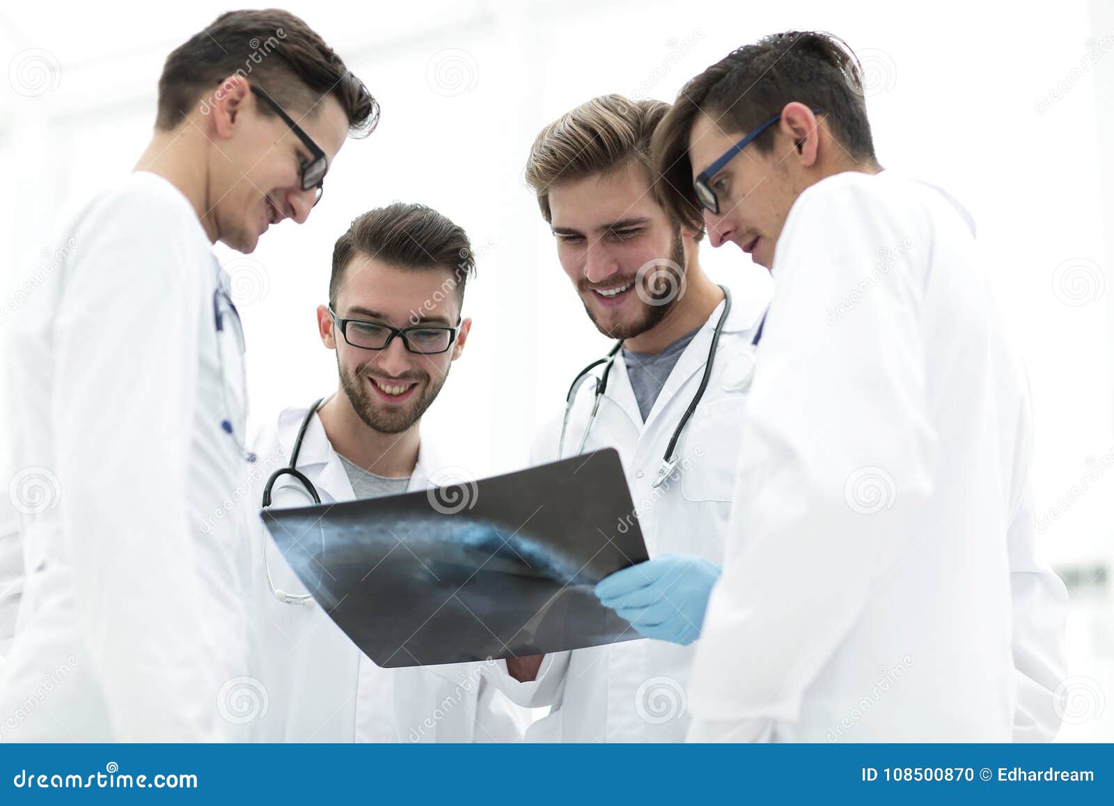 Group of Radiologists Discussing X-ray Stock Photo - Image of looking ...