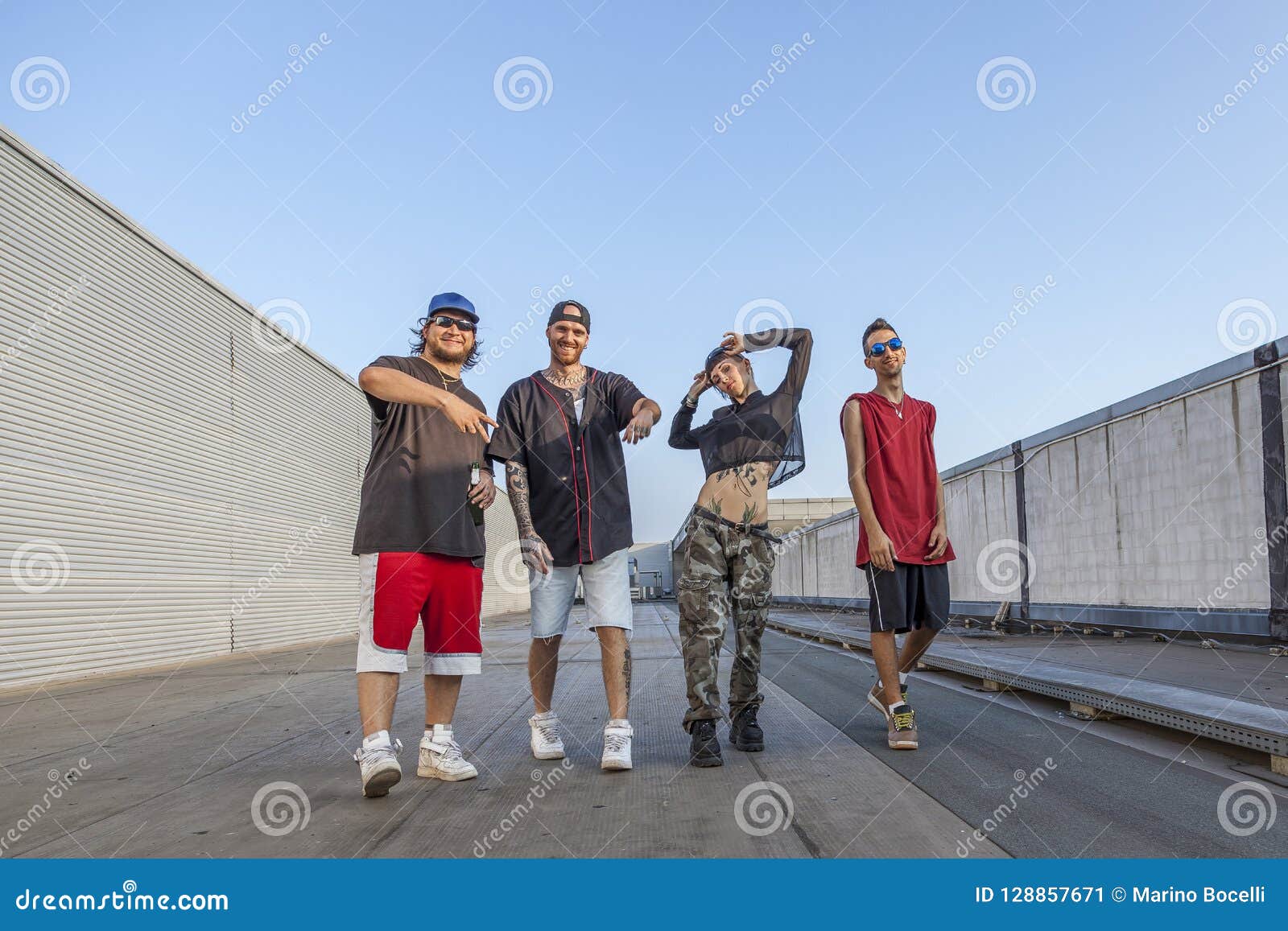 Group of Rappers Posing on the Metal Rooftops Stock Image - Image of ...