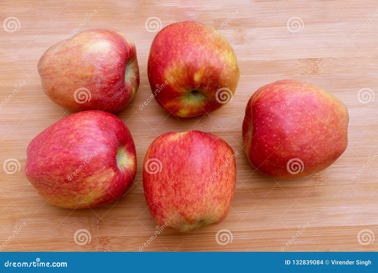 Group of Red Apples on Wooden Surface Stock Photo - Image of lying ...