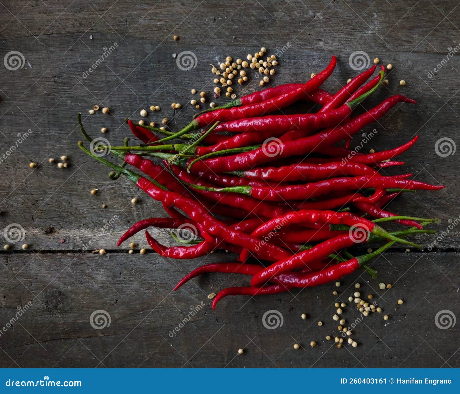 Group of Red Chilli. Isolated on Wooden Texture Background Stock Image ...