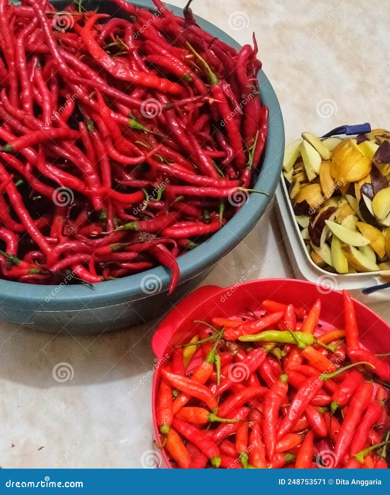 A Group of Red Chilli Small Orange Chilli and Traditional Basic ...
