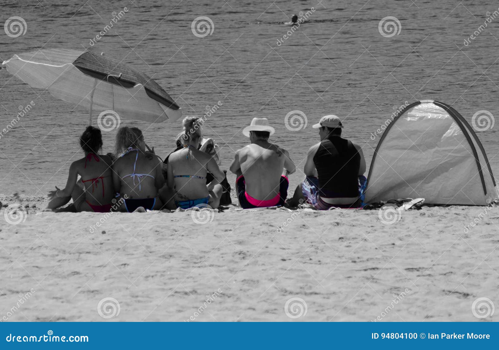 A Group Relaxing on the Beach Editorial Image - Image of portrait ...
