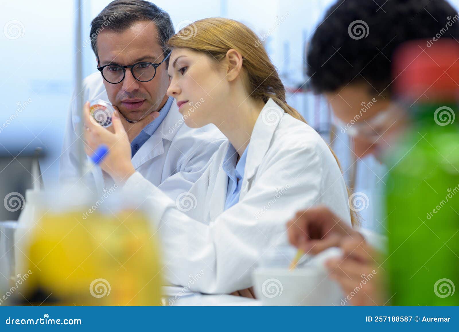 Group Researchers during Work on Devices in Laboratory Stock Image ...