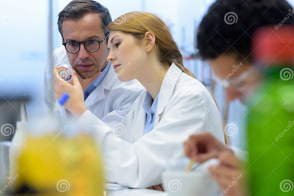 Group Researchers during Work on Devices in Laboratory Stock Image ...