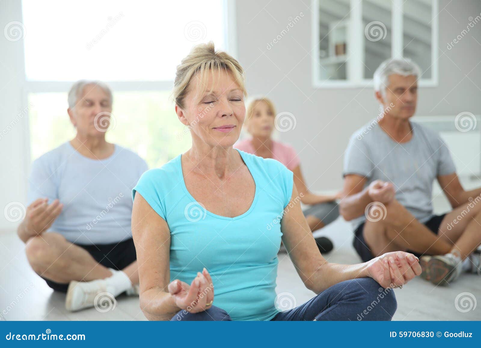 Group of Retired People Relaxing Doing Yoga Excercises Stock Photo ...