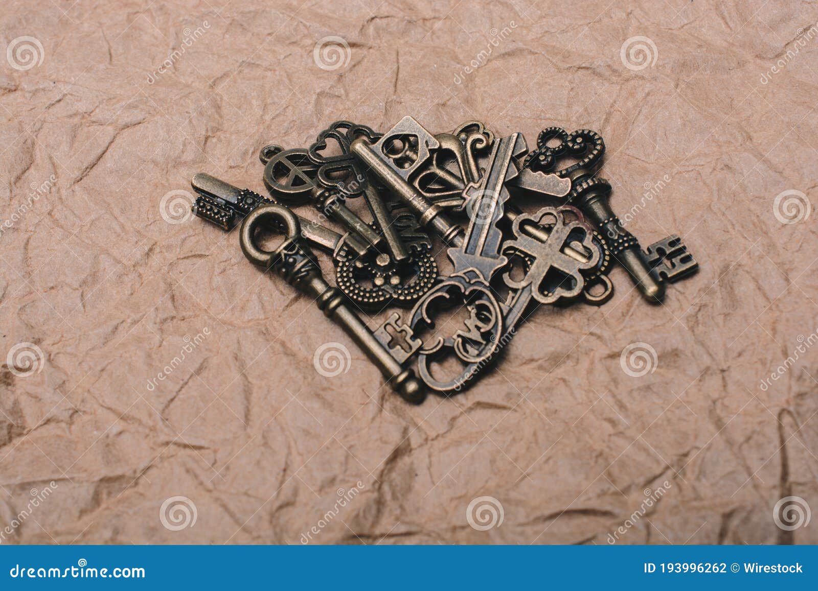 Group of Retro Keys on Wrinkled Paper Stock Photo - Image of keys ...