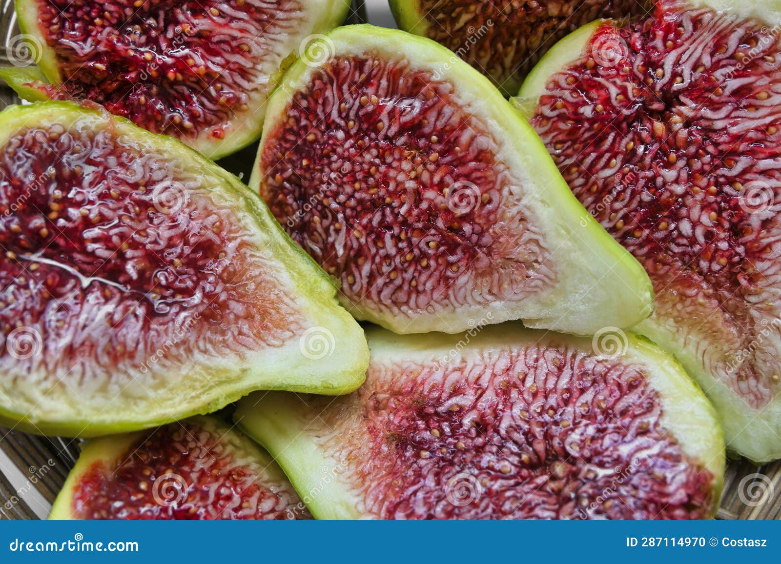Figs cut in half stock photo. Image of nature, group - 287114970