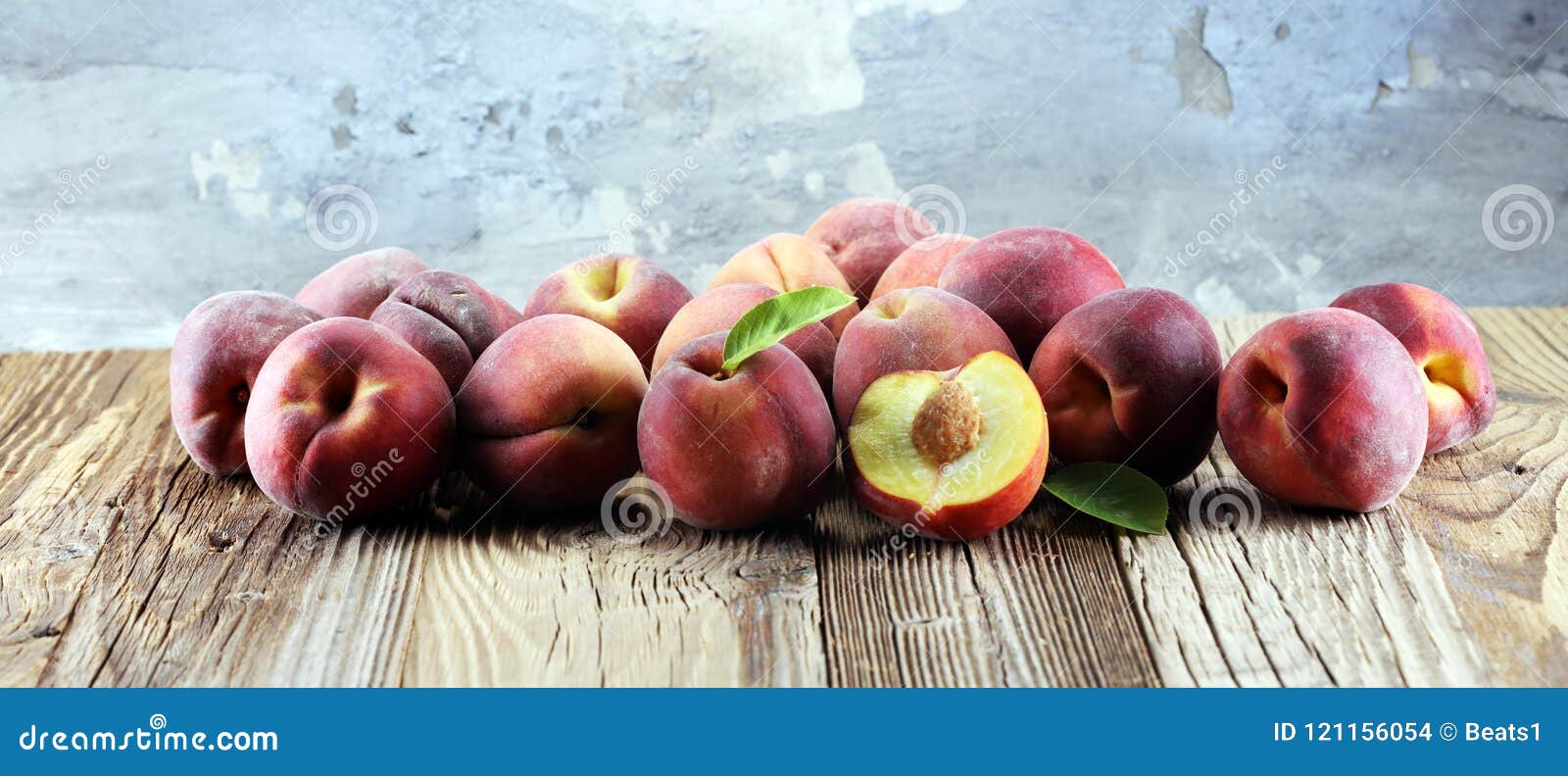 A Group of Ripe Peaches on Table Stock Photo - Image of ripe, green ...