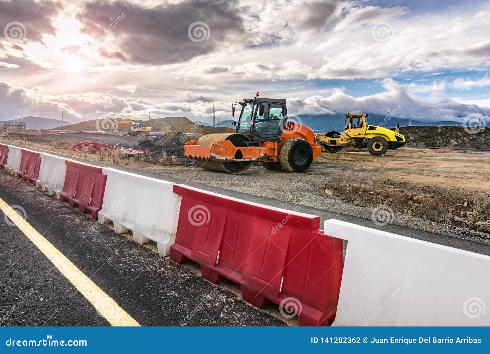 Group of Road Rollers Repairing a Section of a Road Stock Photo - Image ...