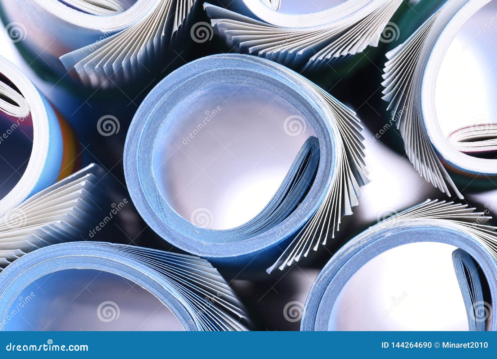 Group of rolled magazines stock photo. Image of journalist - 144264690