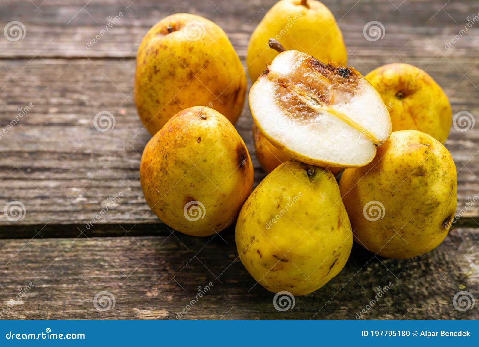 Group of Rotting Pears, Focus on the Half Cutted Fruit Stock Photo ...