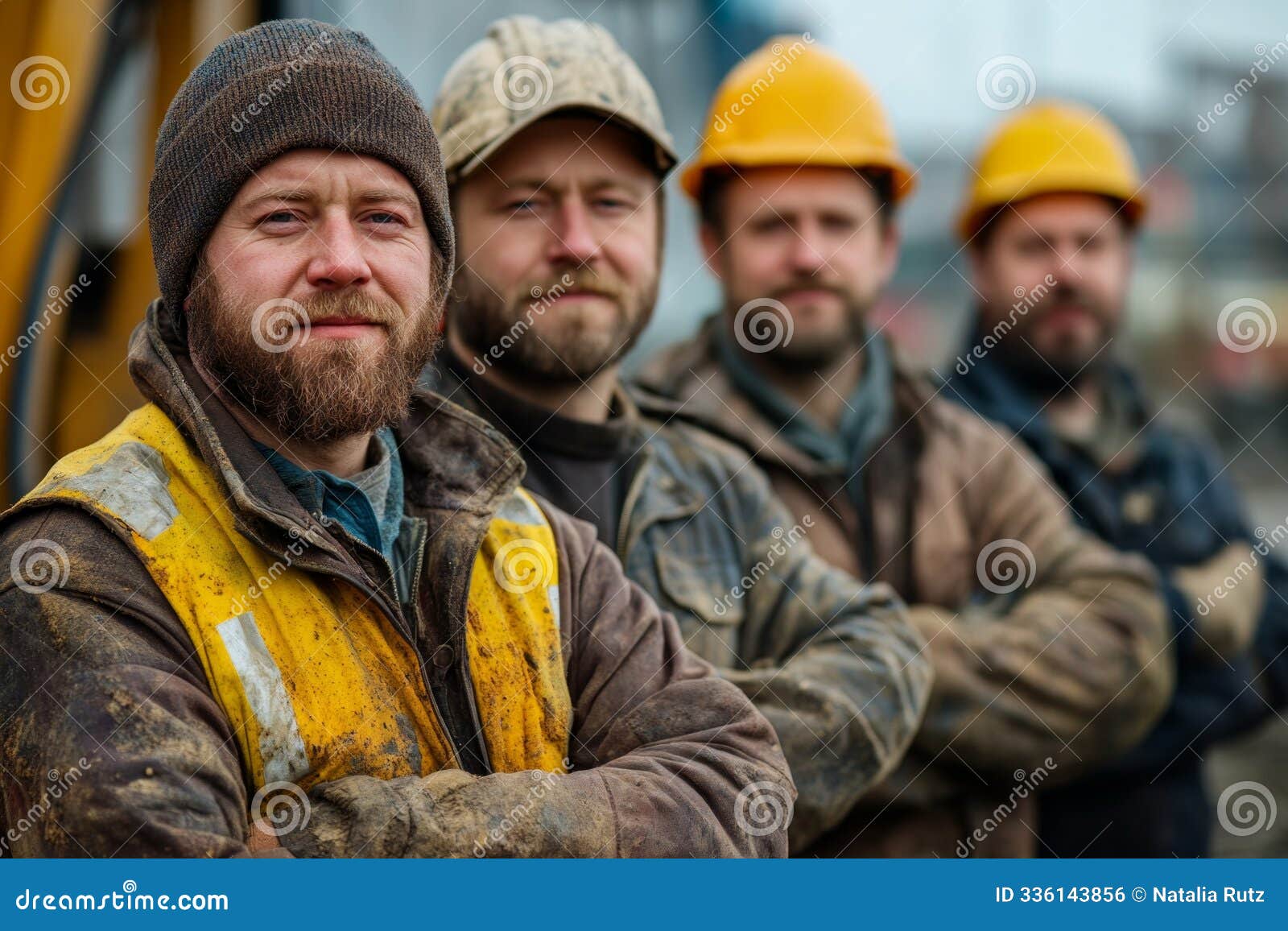A Group of Rugged Construction Workers, Dressed in Worn, Heavy-duty ...