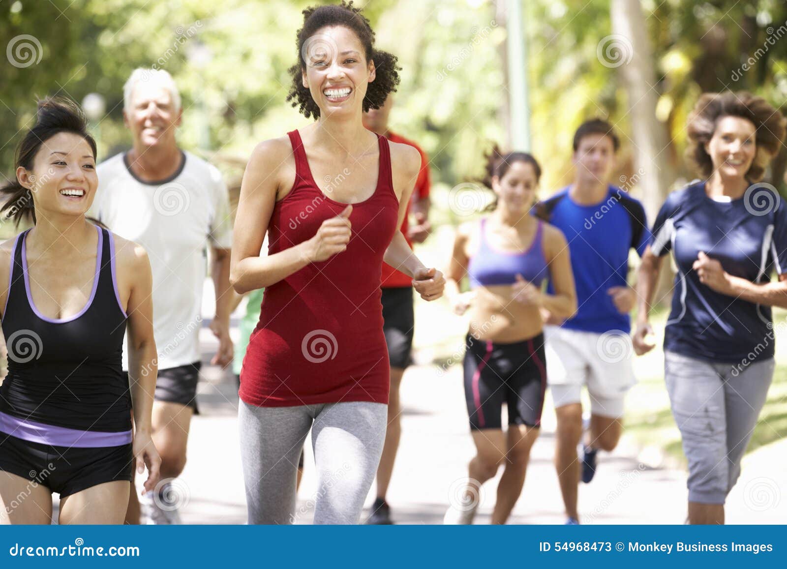 Group of Runners Jogging through Park Stock Image - Image of horizontal ...