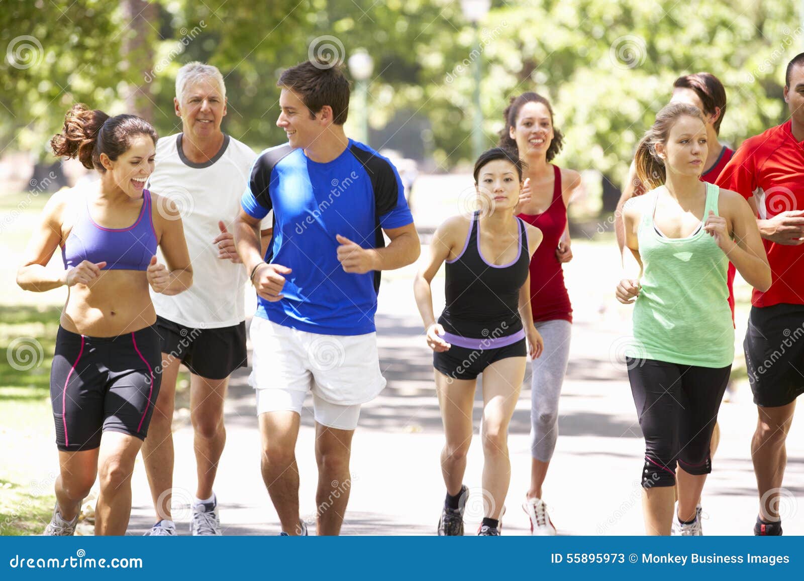 Group of Runners Jogging through Park Stock Image - Image of active ...