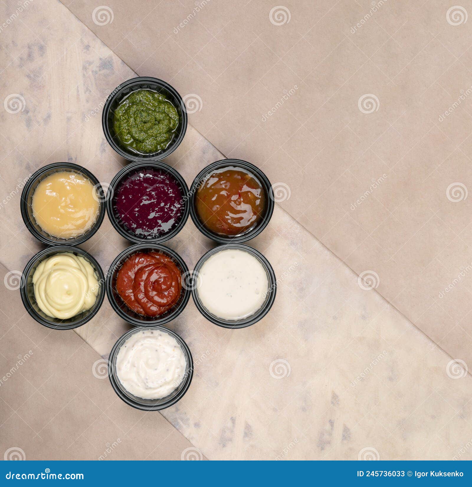 A Group of Sauces on a Paper Background with Texture Stock Image ...