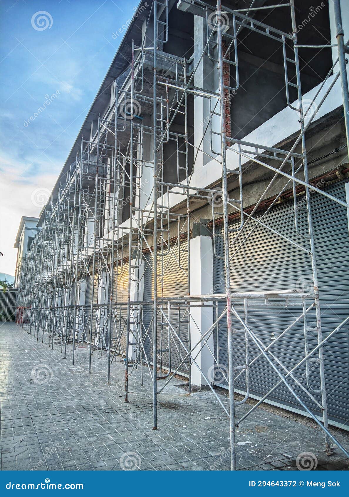 A Group of Scaffolding on the Side of a Building. Stock Photo - Image ...