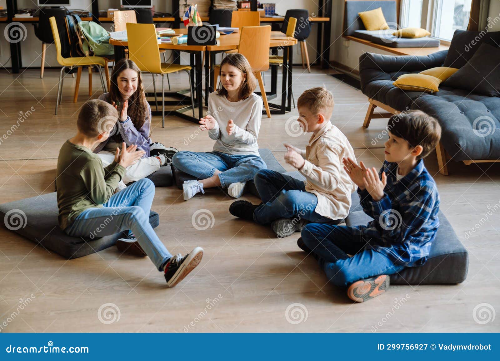 Group of Children Clapping Hands while Sitting in Library Stock Image ...