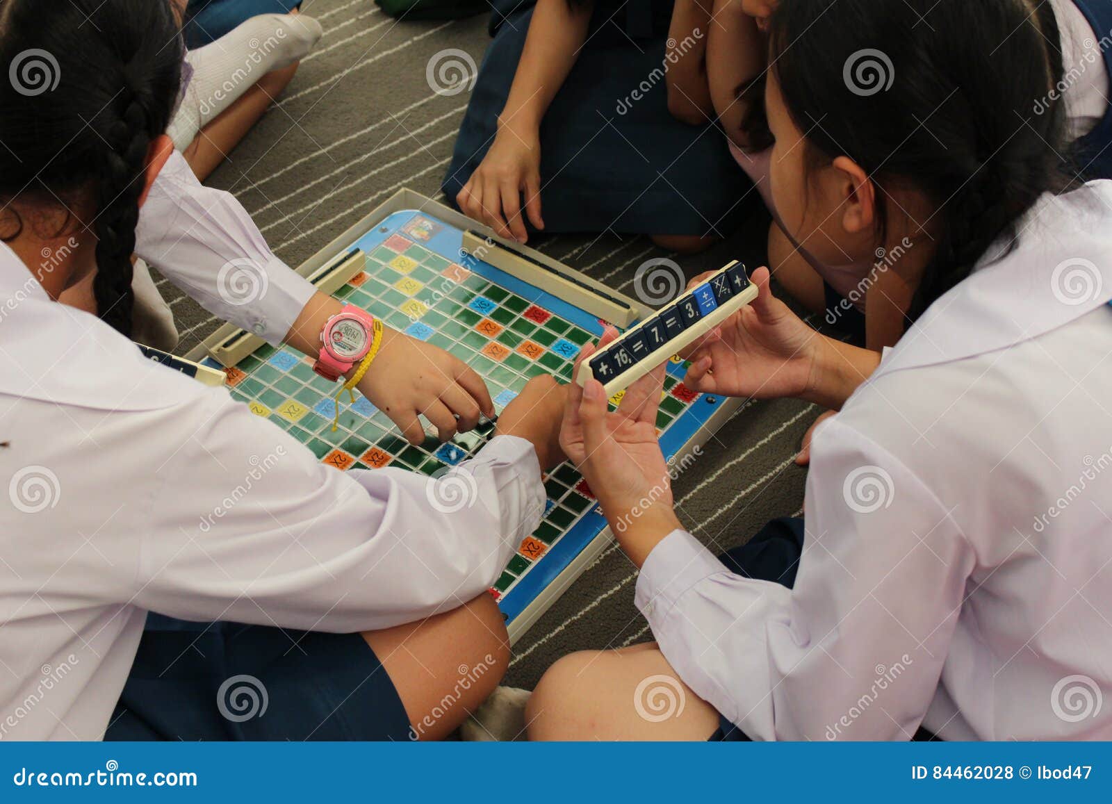 People Playing Scrabble