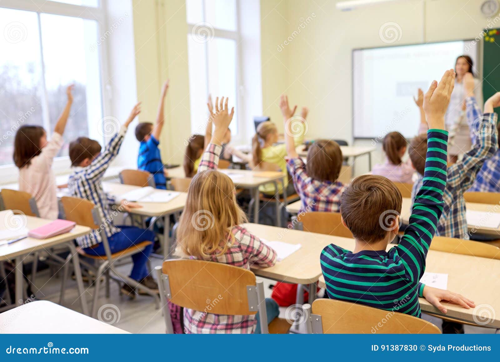 Group of School Kids Raising Hands in Classroom Stock Photo - Image of ... Group of School Kids Raising Hands in Classroom Stock Photo - Image of ...