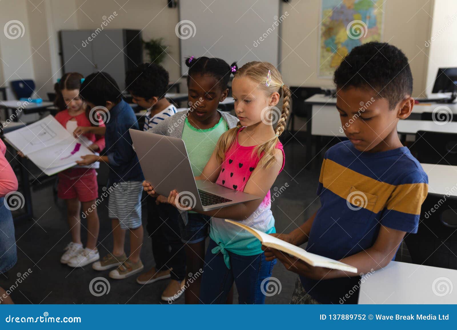 Group of School Kids Studying Together in Classroom of Elementary ...