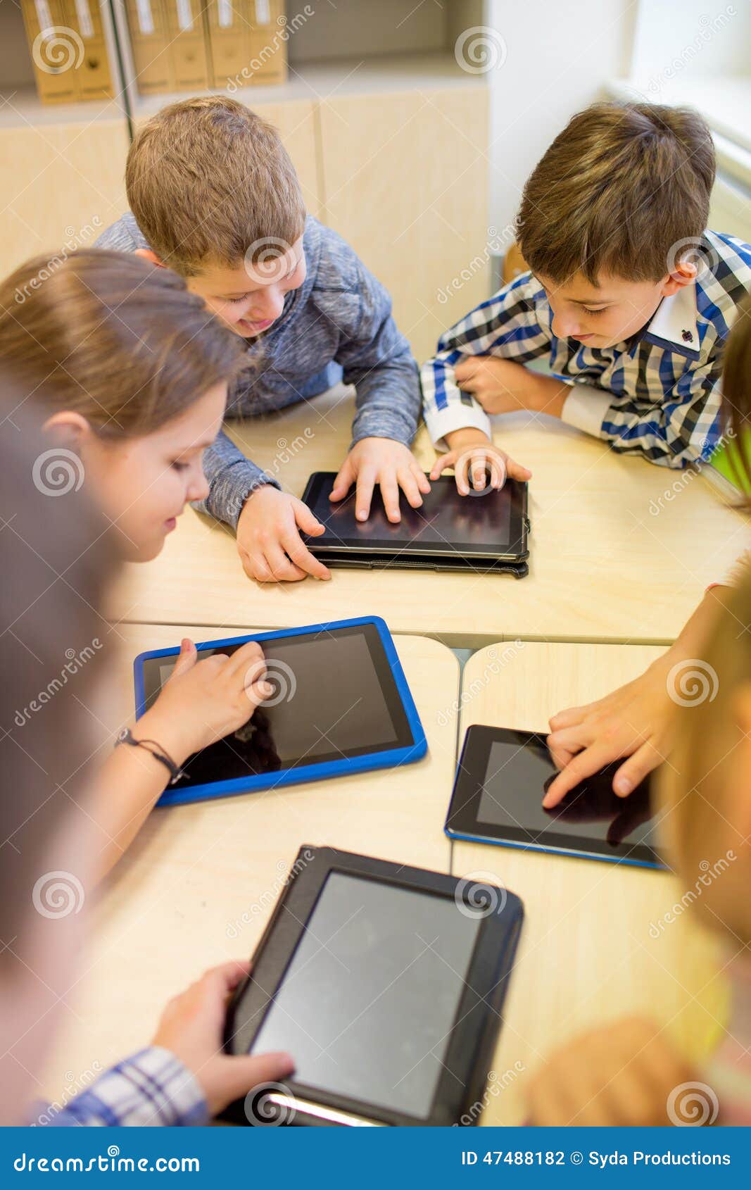 Group of School Kids with Tablet Pc in Classroom Stock Photo - Image of ...