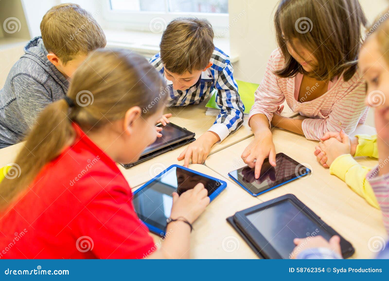 Group of School Kids with Tablet Pc in Classroom Stock Photo - Image of ...