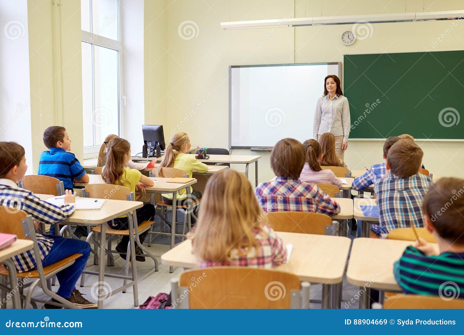 Group of School Kids with Teacher in Classroom Stock Image - Image of ...