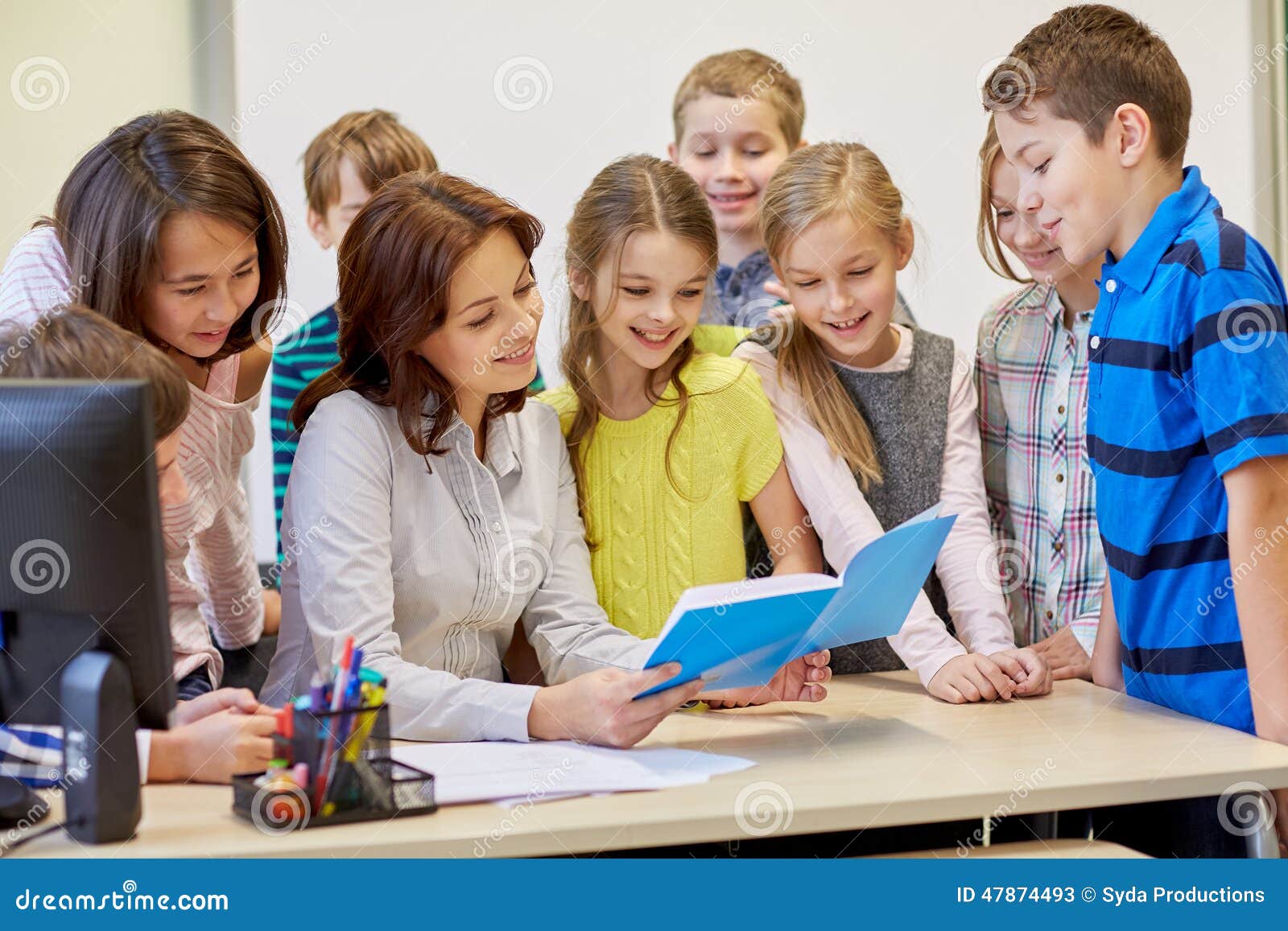 Group of School Kids with Teacher in Classroom Stock Image - Image of ...
