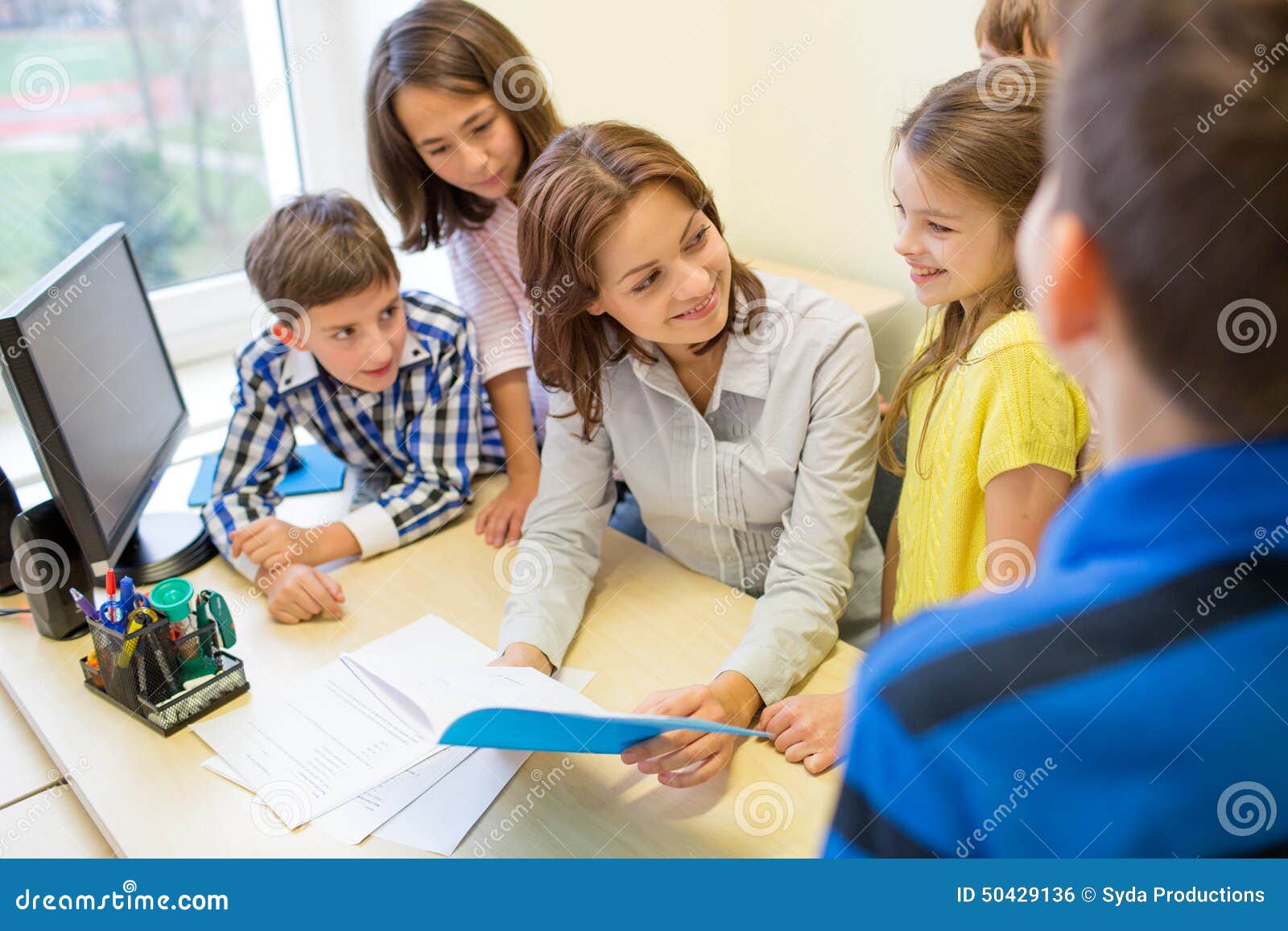 Group of School Kids with Teacher in Classroom Stock Photo - Image of ...