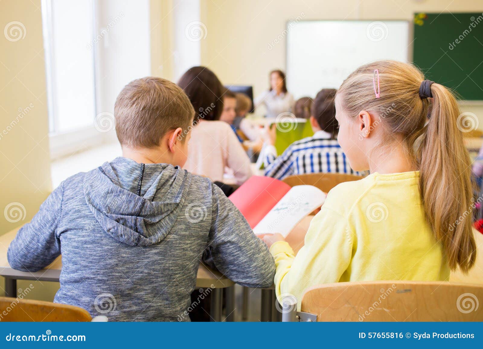 Group of School Kids Writing Test in Classroom Stock Photo - Image of ...