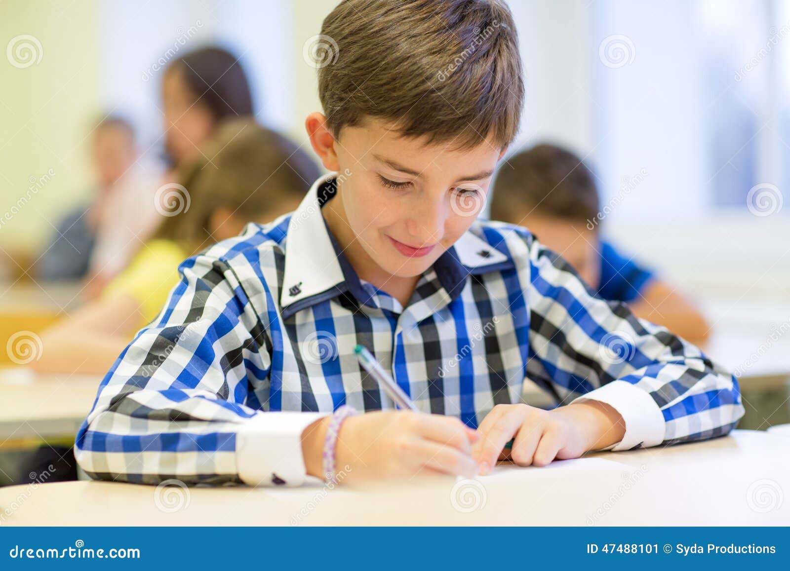 Group of School Kids Writing Test in Classroom Stock Image - Image of ...