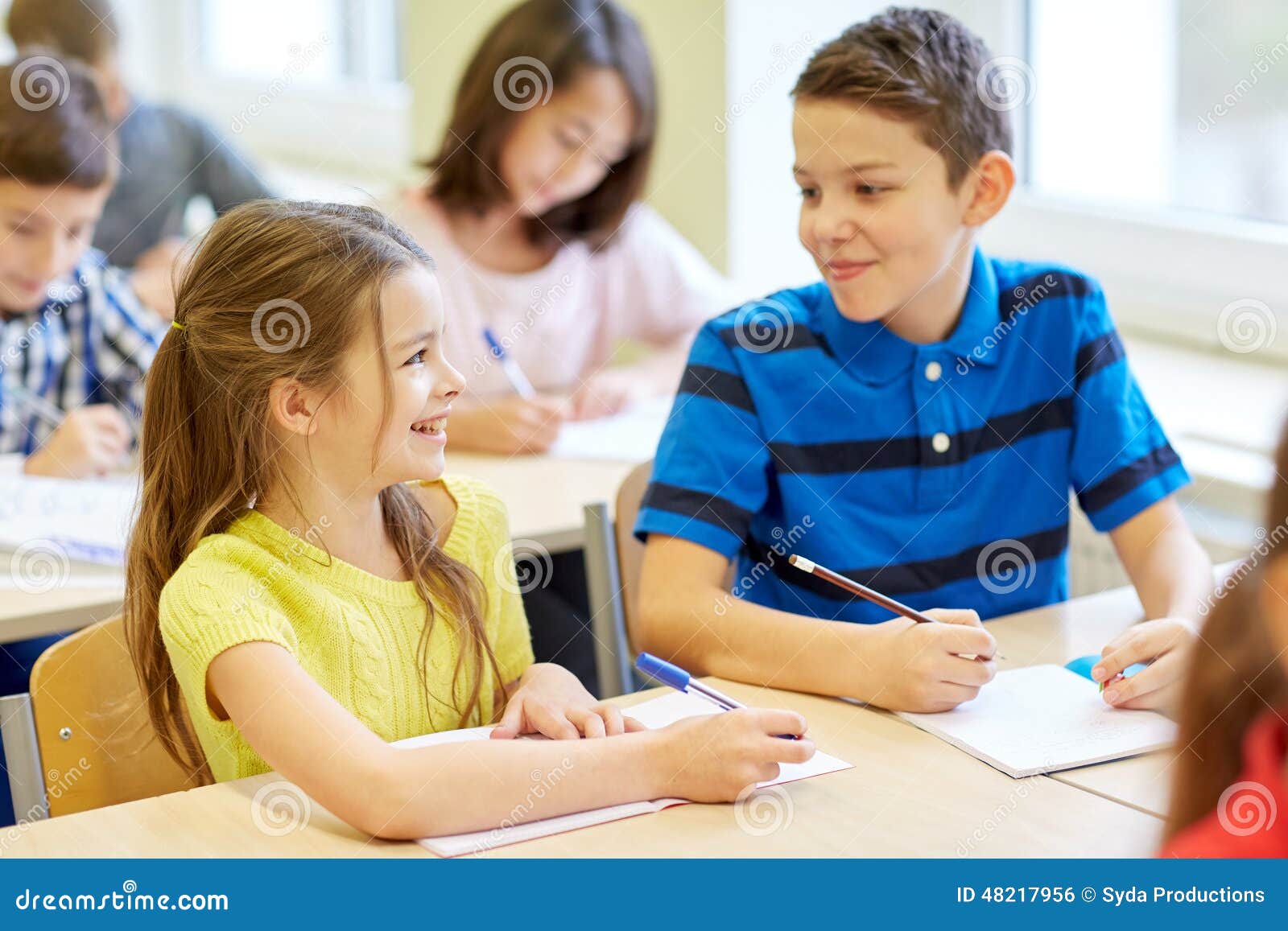 Group of School Kids Writing Test in Classroom Stock Photo - Image of ...