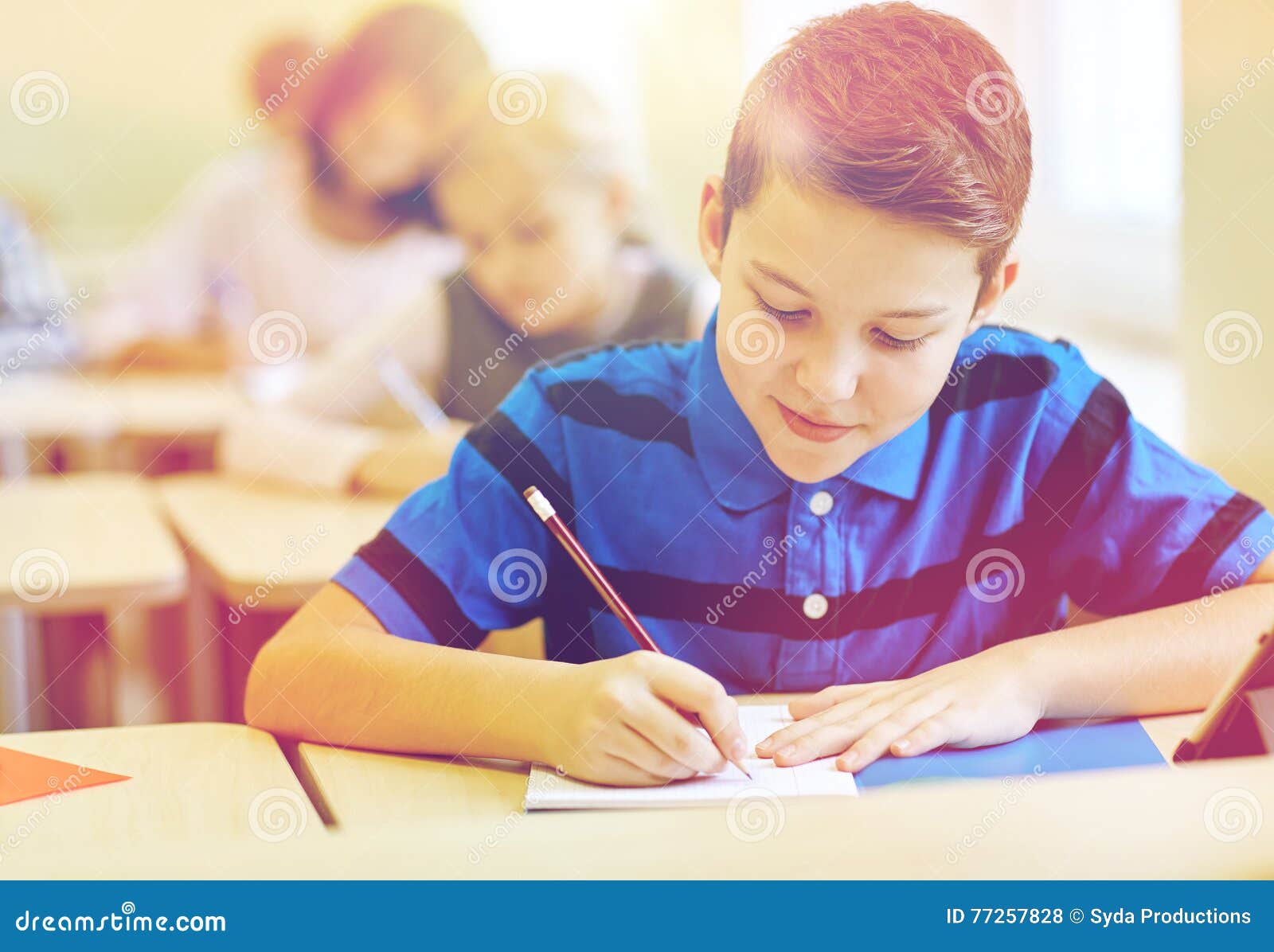 Group of School Kids Writing Test in Classroom Stock Photo - Image of ...