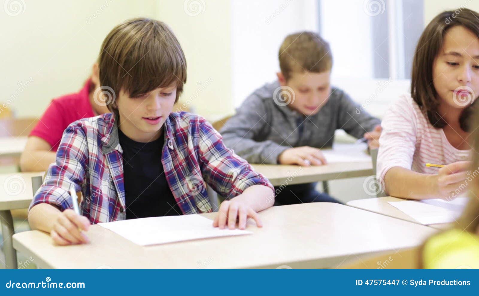 Group of School Kids Writing Test in Classroom Stock Video - Video of ...