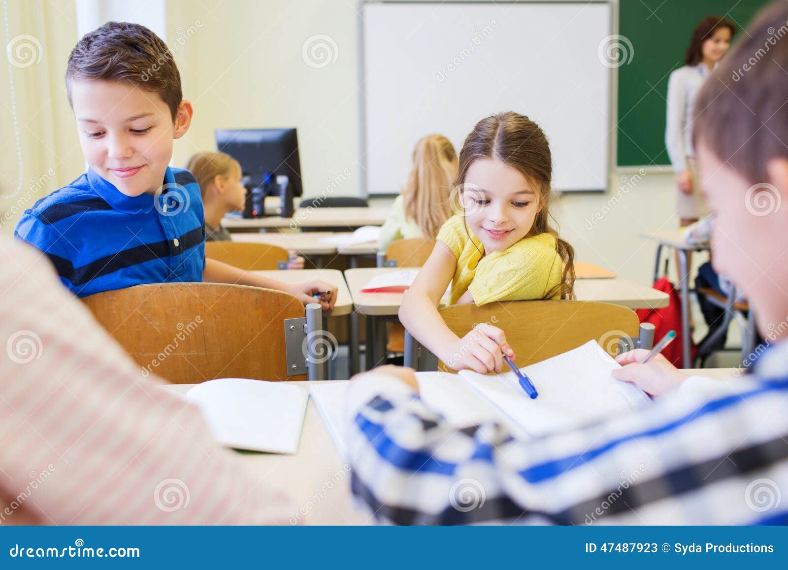Group of School Kids Writing Test in Classroom Stock Image - Image of ...