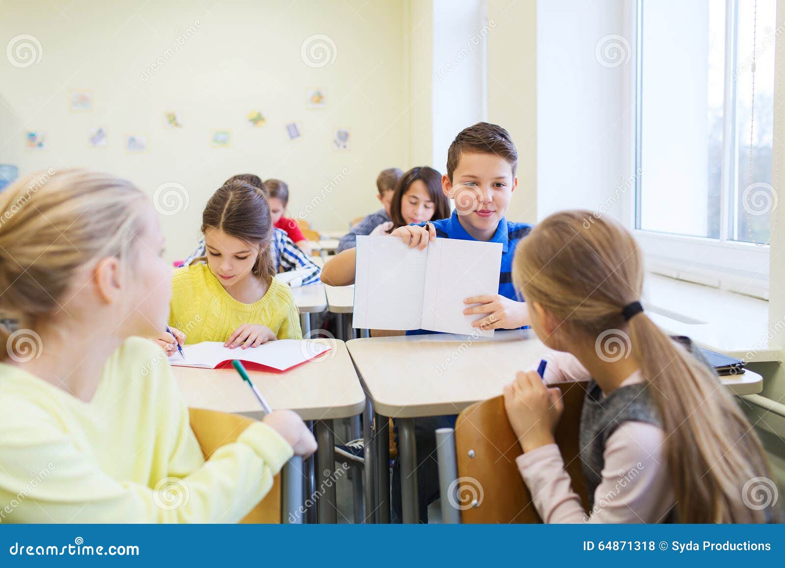 Group of School Kids Writing Test in Classroom Stock Photo - Image of ...