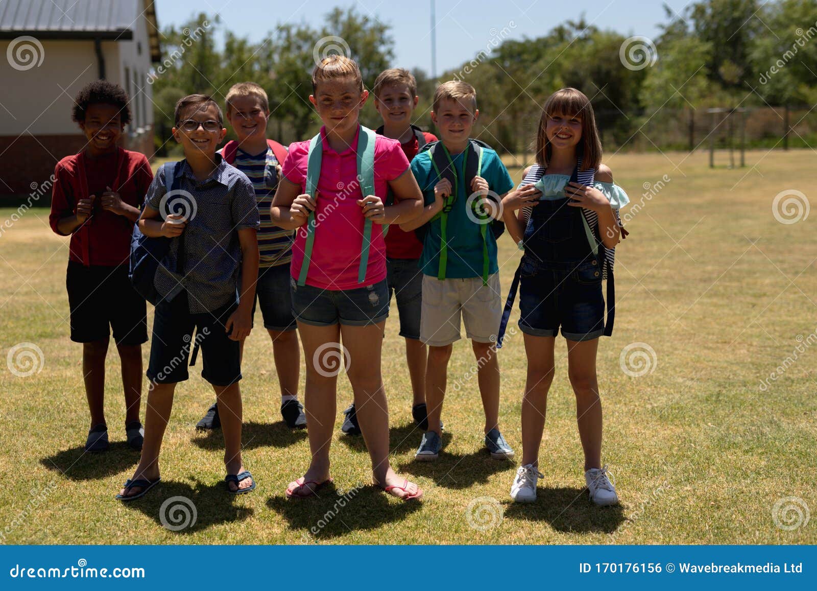 Group Of Schoolchildren Walking Single File With Hands On Each Others ...