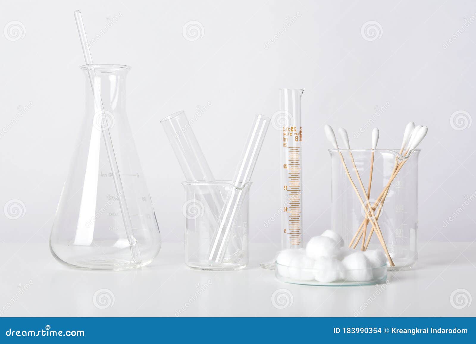 Group of Scientific Laboratory Glassware with Clear Liquid Solution ...