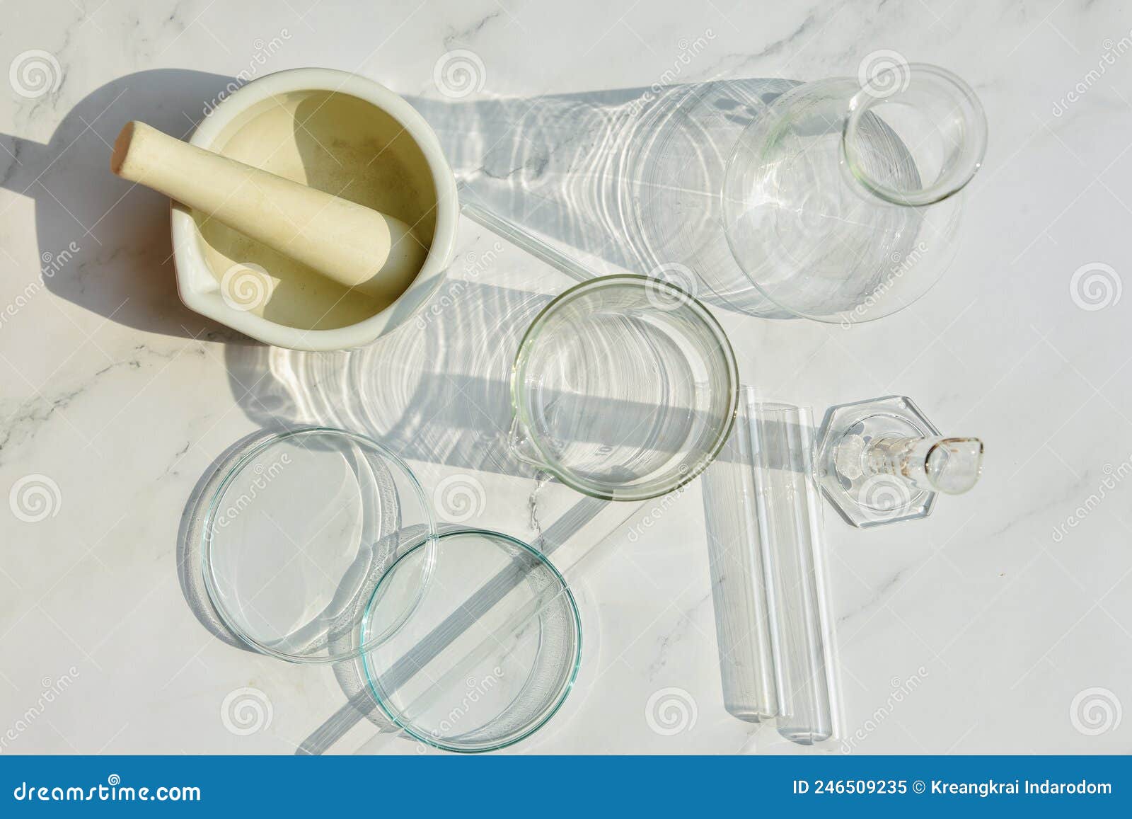 Group of Scientific Laboratory Glassware with Clear Liquid Solution ...
