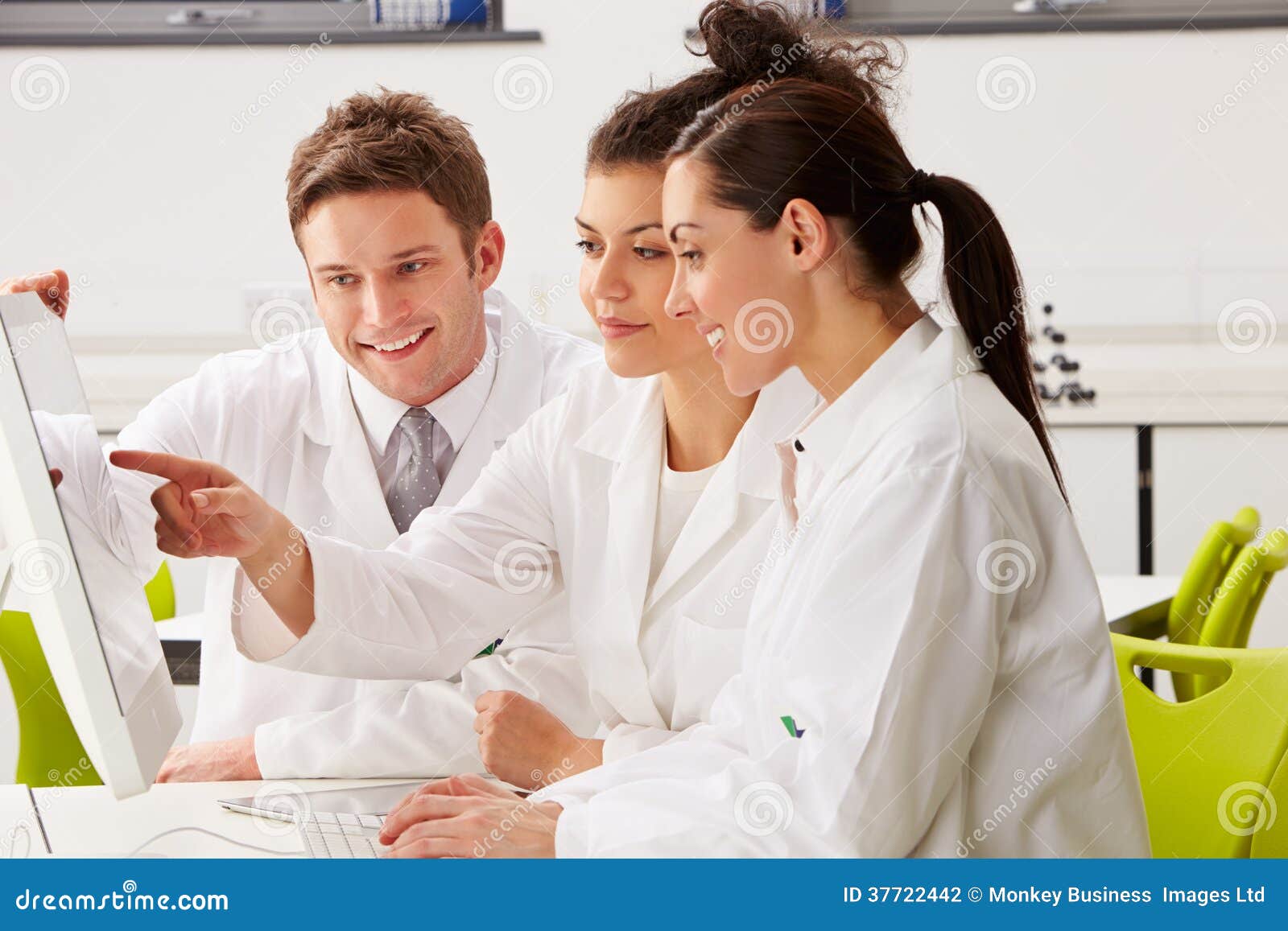 Group of Scientists Checking Laboratory Results on Computer Stock Photo ...