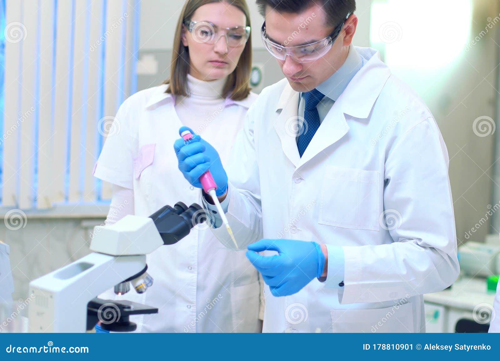 A Group of Scientists Conducts Research in a Scientific Laborato Stock ...