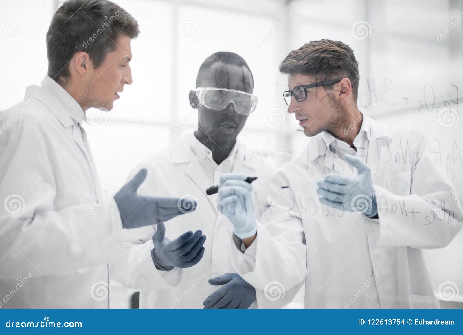 Group of Scientists Discussing Chemical Formulas Stock Photo - Image of ...