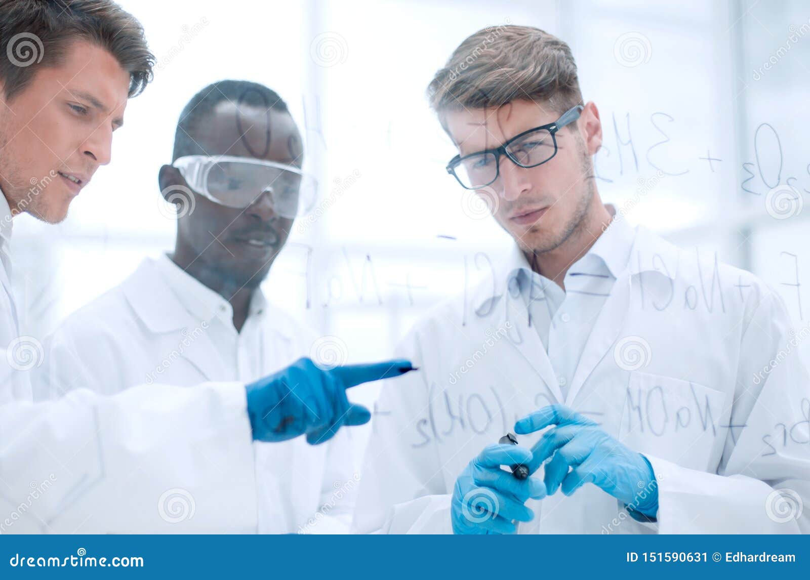 Group of Scientists Discussing Chemical Formulas Stock Image - Image of ...