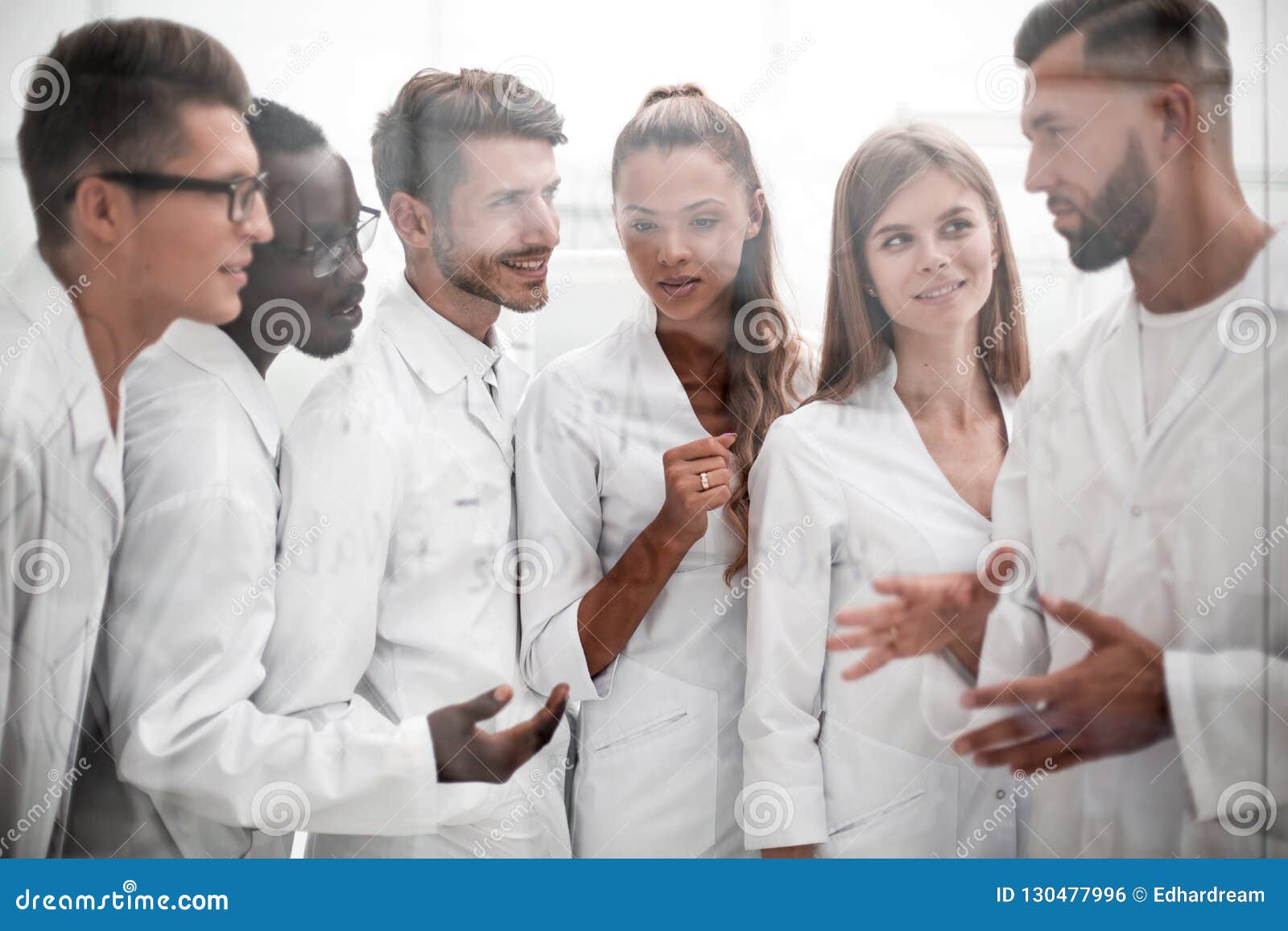 Group of Scientists Discussing Chemical Formulas Stock Photo - Image of ...
