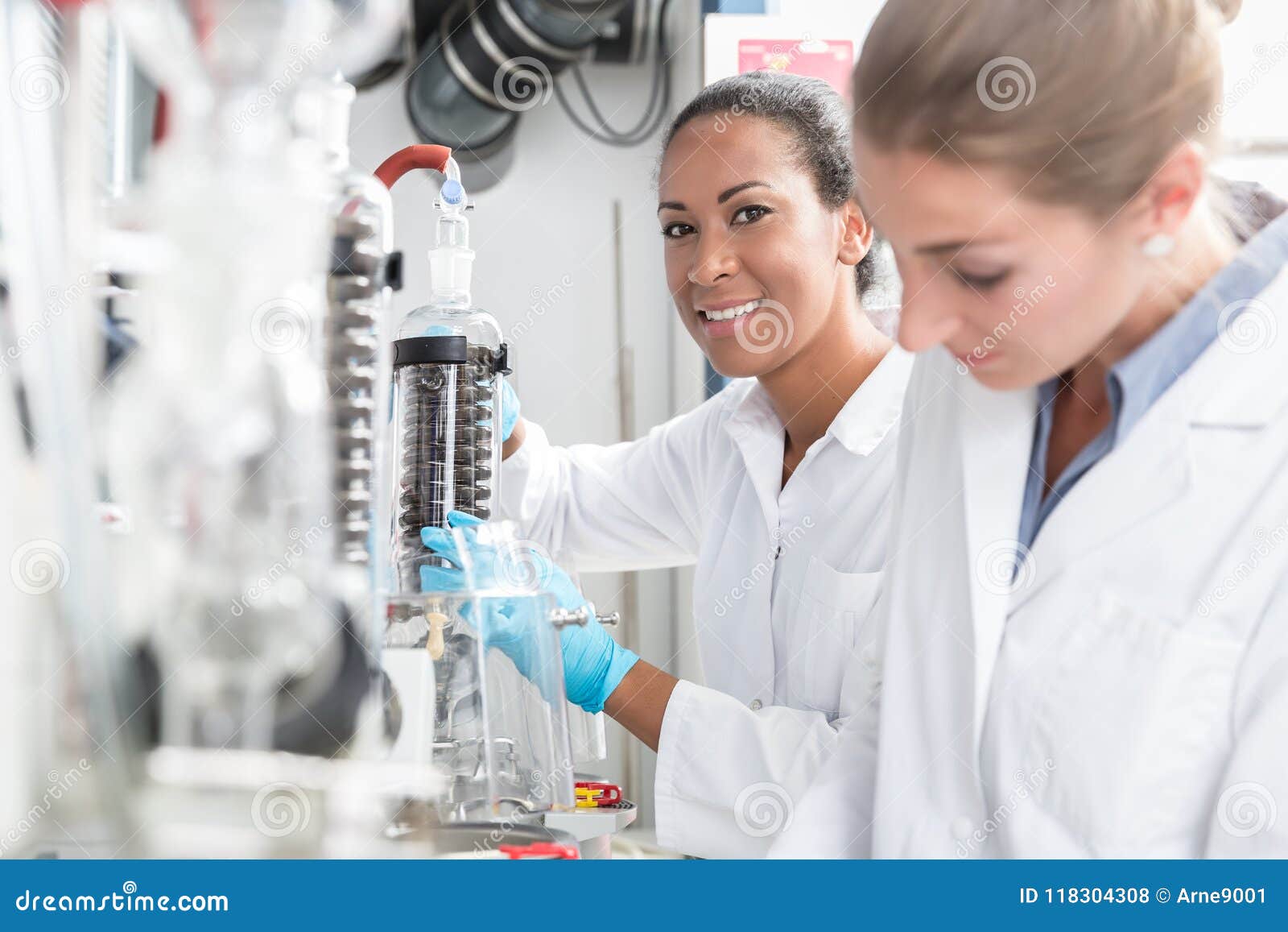 Group of Scientists with Gloves and Gowns in Laboratory Stock Photo ...
