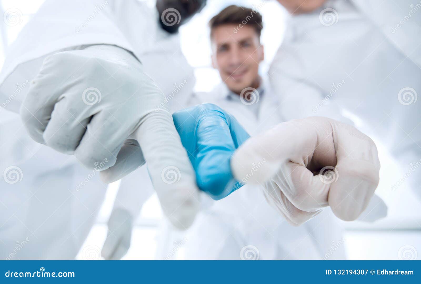 Group of Scientists Pointing To the Laboratory Table Stock Image ...