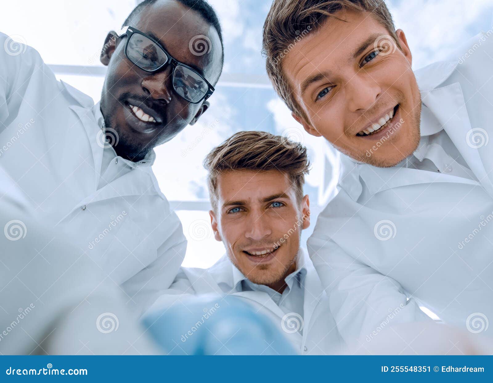 Group of Scientists Pointing To the Laboratory Table Stock Image ...