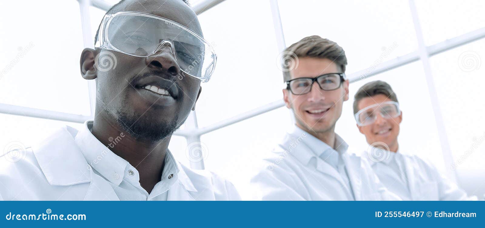 Group of Scientists Sitting at the Laboratory Table Stock Image - Image ...